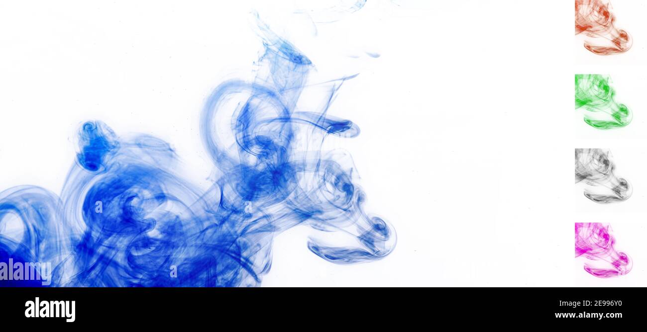 Blue ink injected into water from syringe, colour mixing with water ...