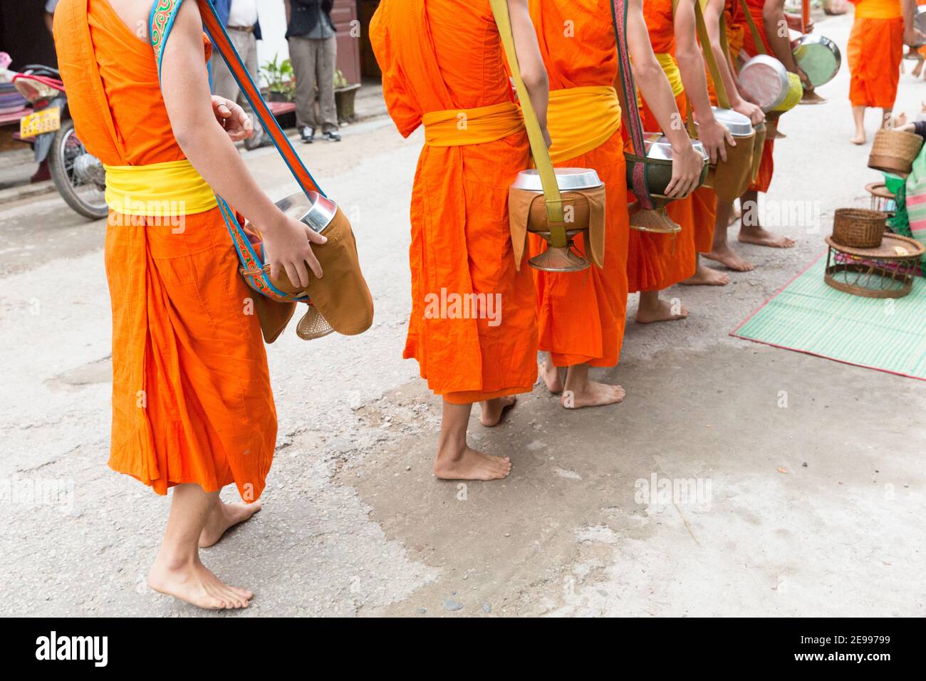 Luang Prabang, Laos Tak Bat or The monk's morning alms procession Stock ...