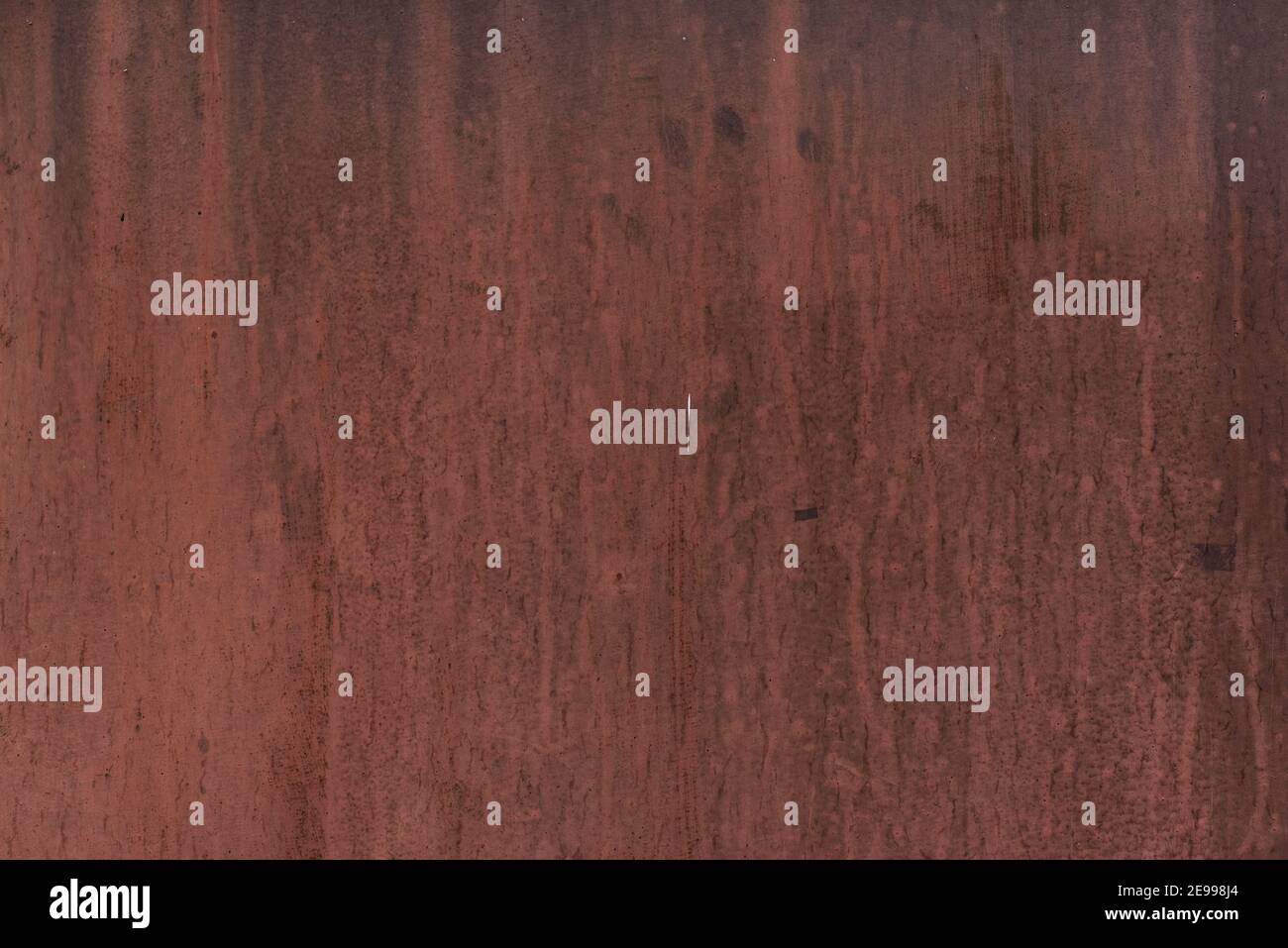 Plate of metal rusty texture with traces of a paint faint color ...