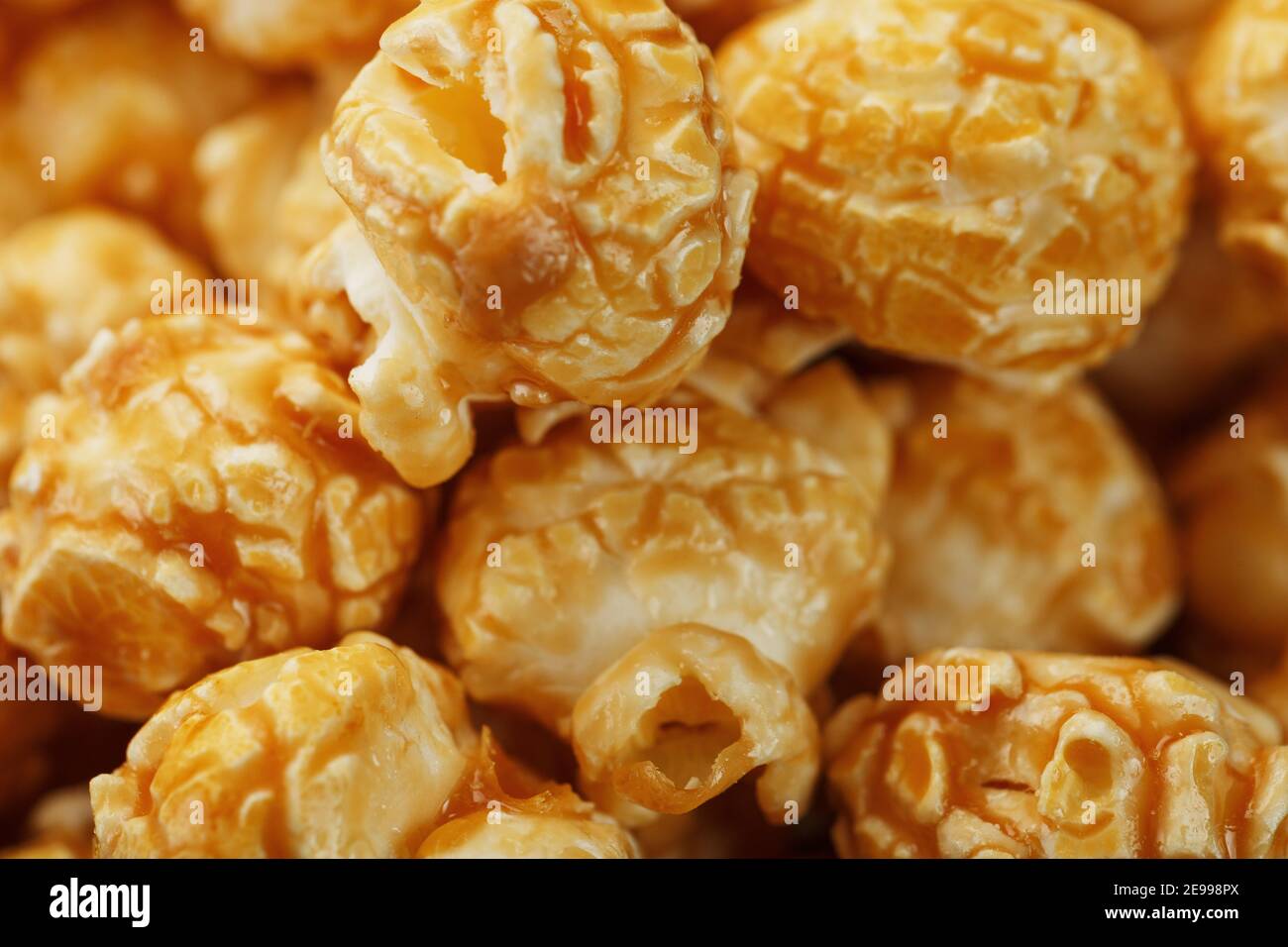 Caramel popcorn close-up as a background, full-screen texture ...
