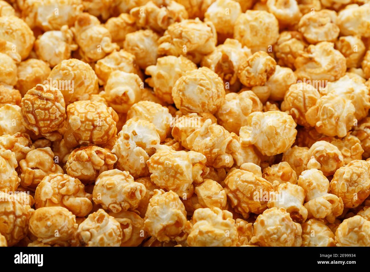 Caramel popcorn close-up as a background, full-screen texture ...