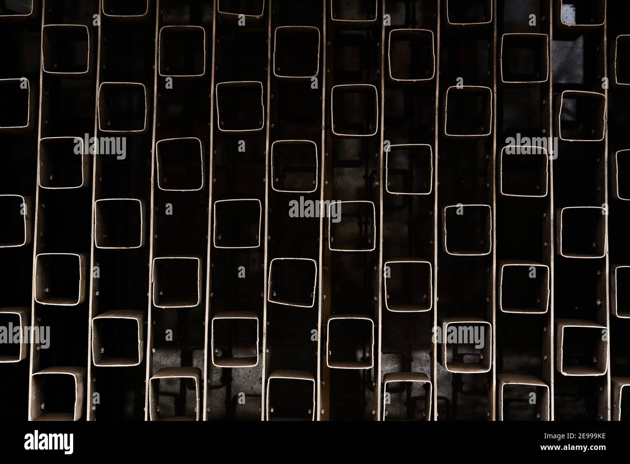 Rusty metal rods isolated on black background poverty prison age retro ...