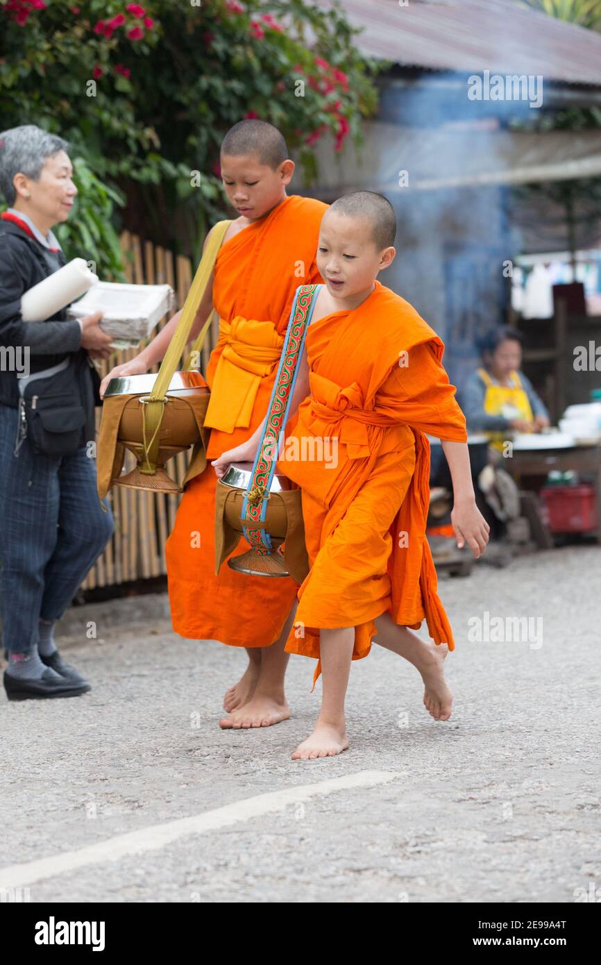 Luang Prabang, Laos Tak Bat or The monk's morning alms procession Stock ...