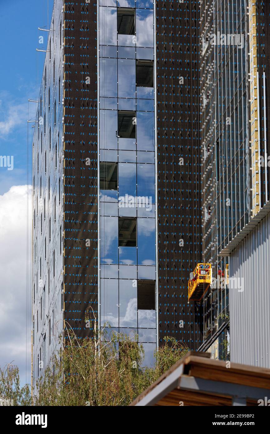 Reconstruction, facade insulation and installation of large windows in ...