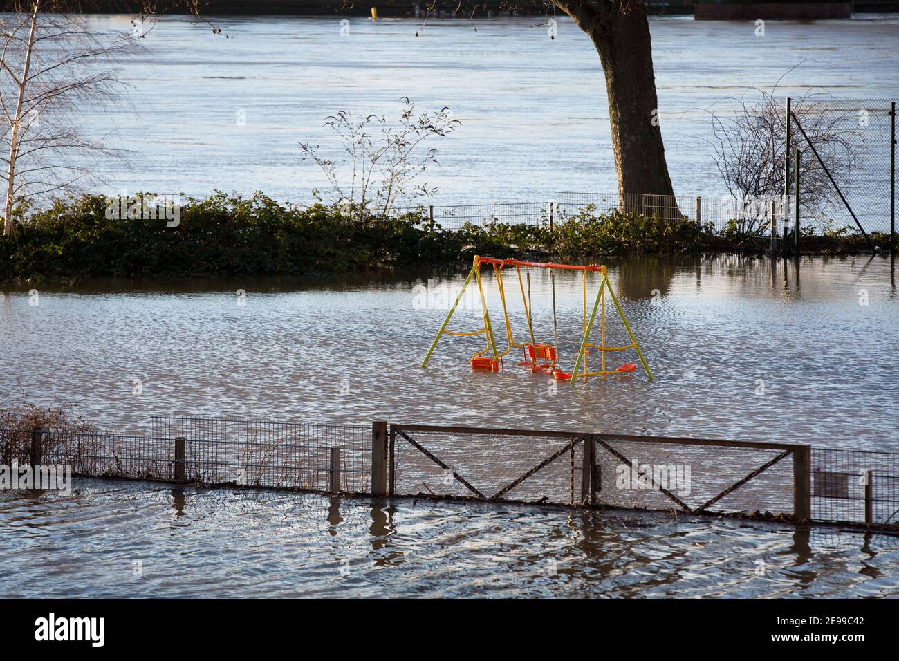 Rhine Flood In Cologne, Flooded Playground, Swings In The Water ...