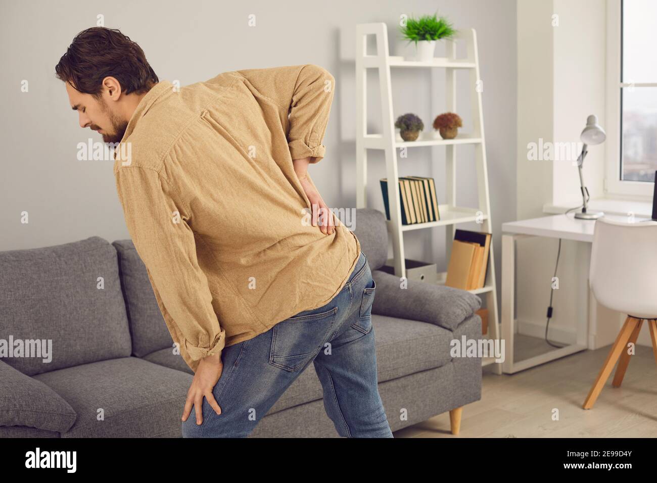 Lower back pain man hi-res stock photography and images - Alamy