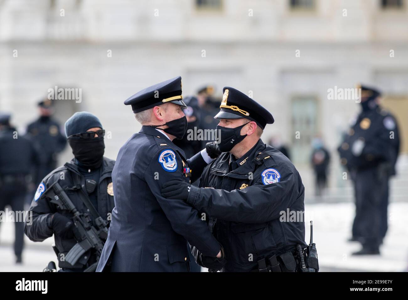 U.S. Capitol police comfort each other following the departure of an ...