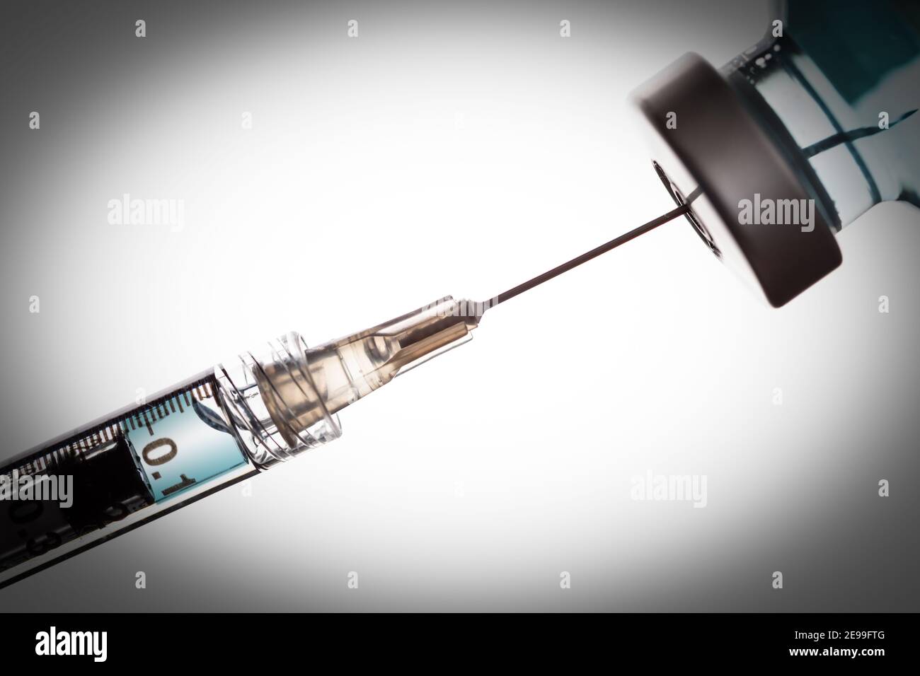 Medical Syringe Needle and Vaccine Vial Against White Background Stock ...