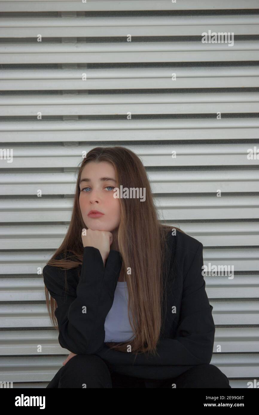 Fashion portrait of beautiful woman with total black style on white ...