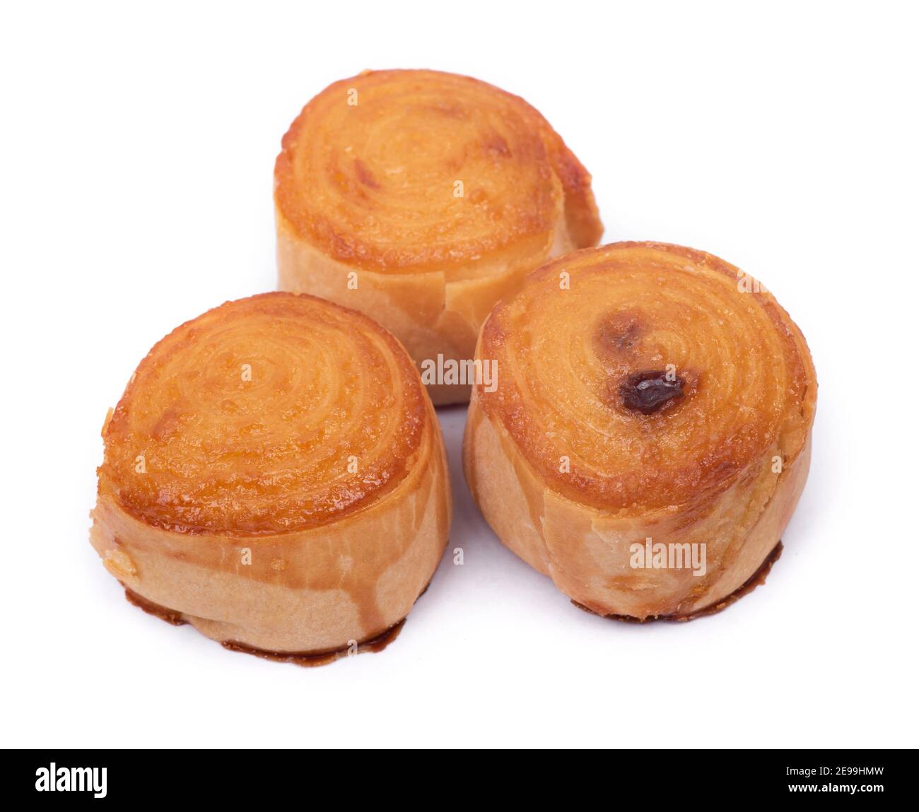 Group of rolled pastries isolated over white background Stock Photo - Alamy