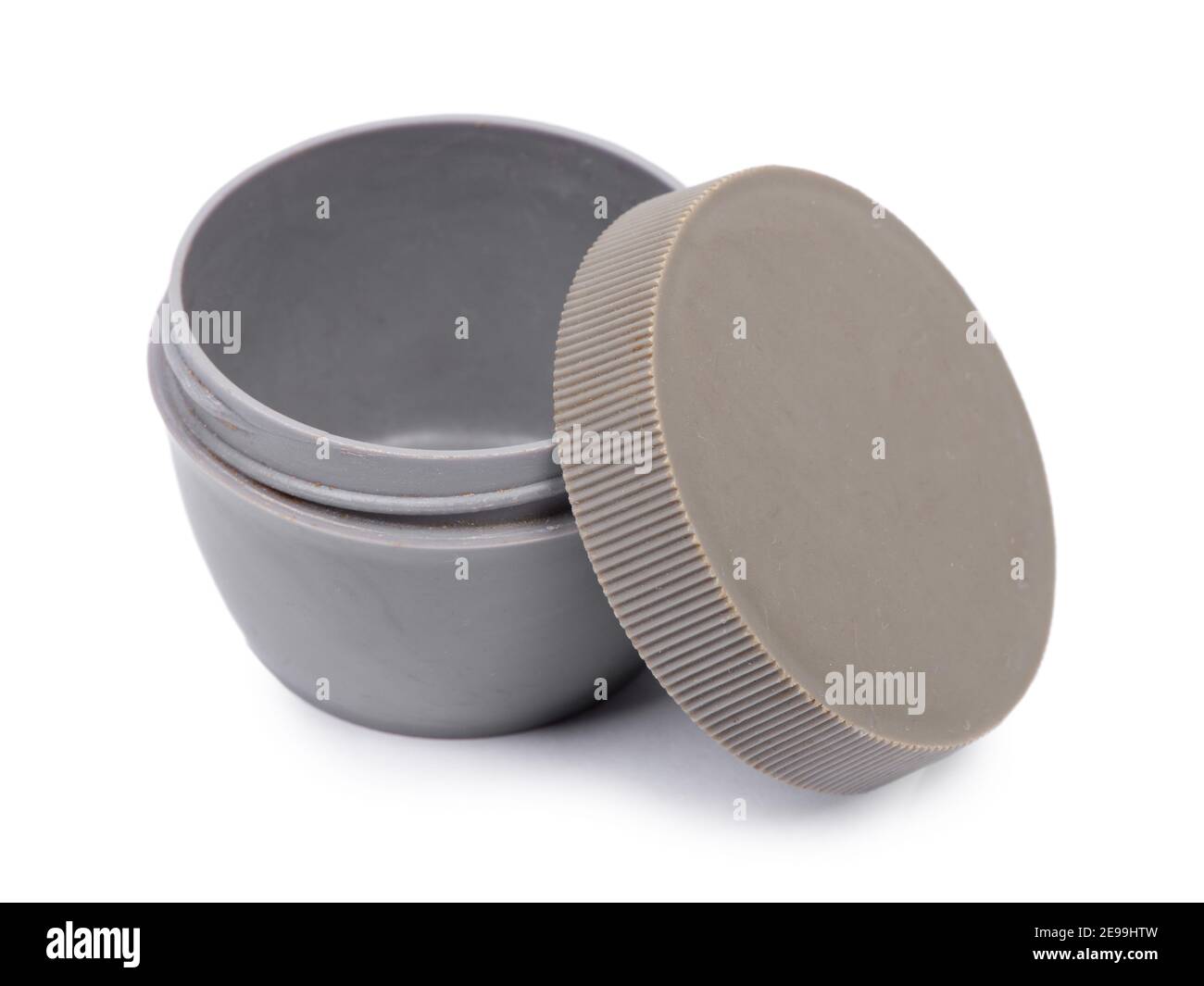 Old plastic jar with lid isolated on white background Stock Photo - Alamy