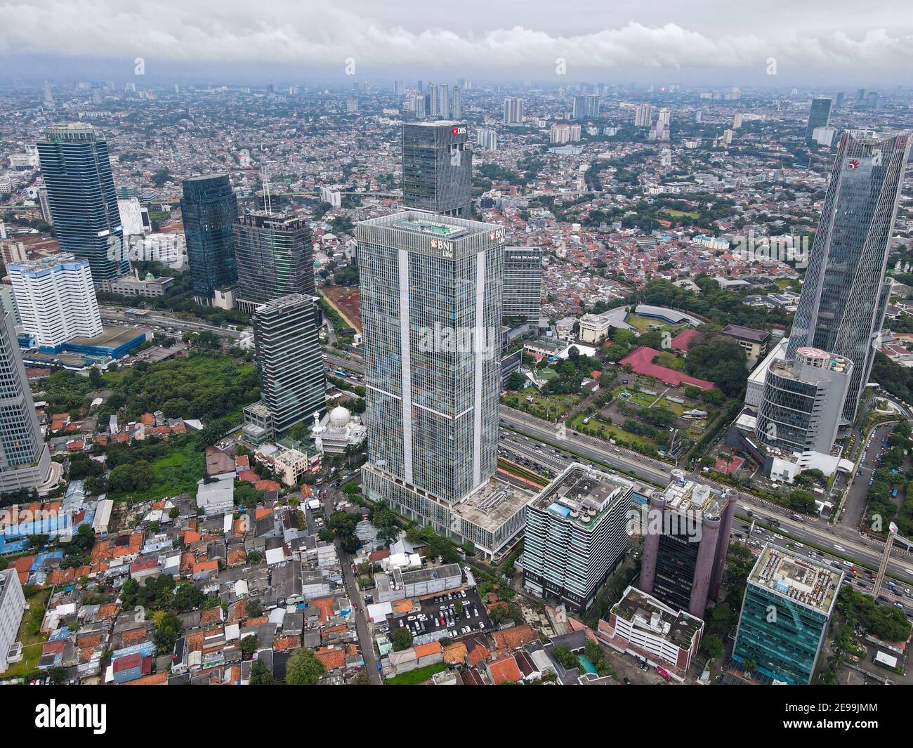 Aerial view of BNI Life building in Jakarta and noise cloud with ...