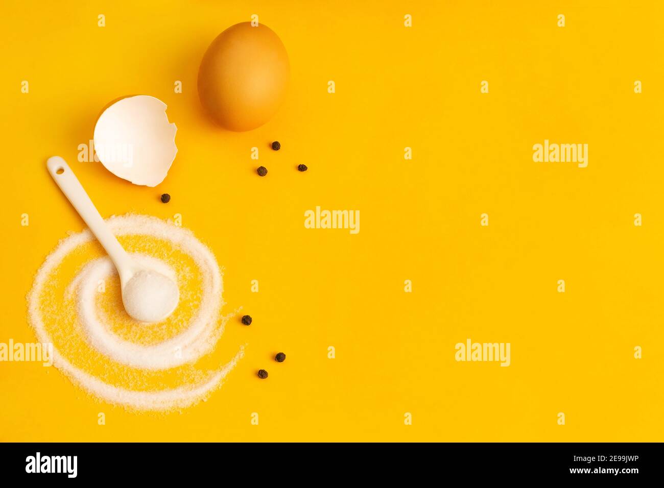 Freshly boiled brown boiled egg for breakfast with sea salt and pepper ...