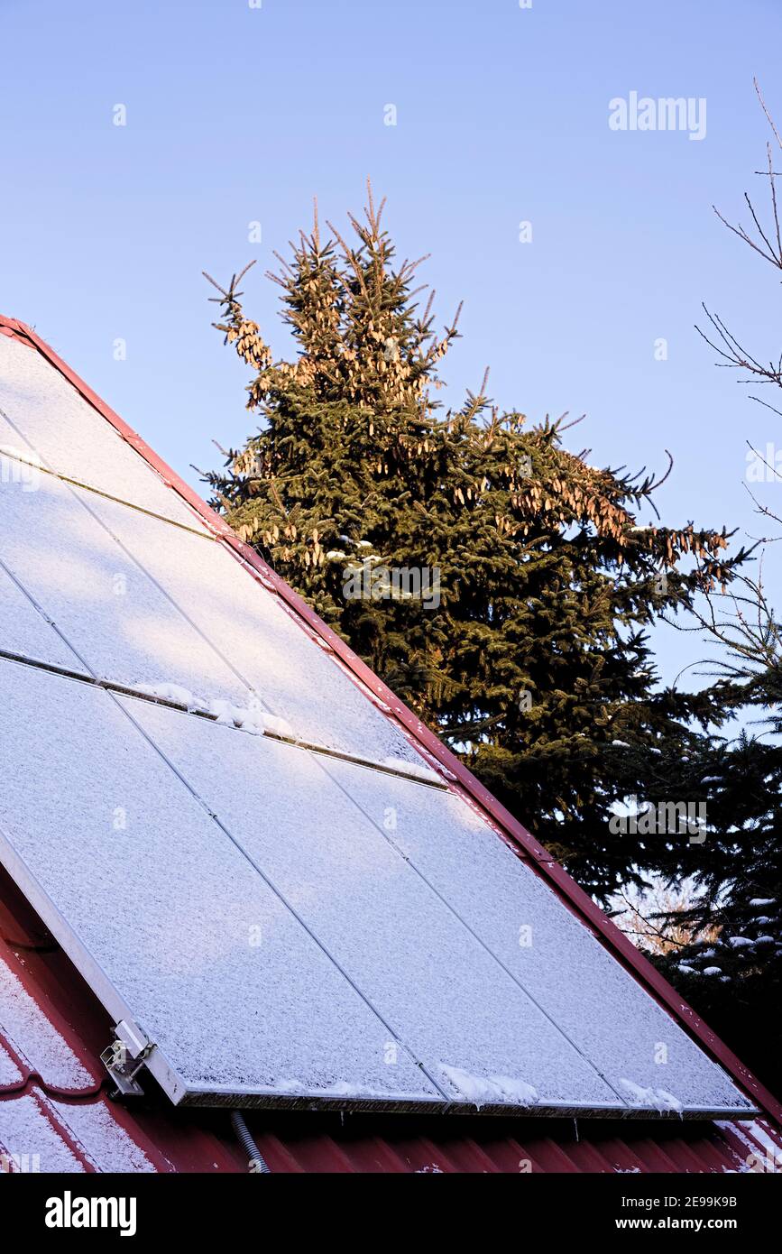 Solar panels covered with snow hi-res stock photography and images - Alamy