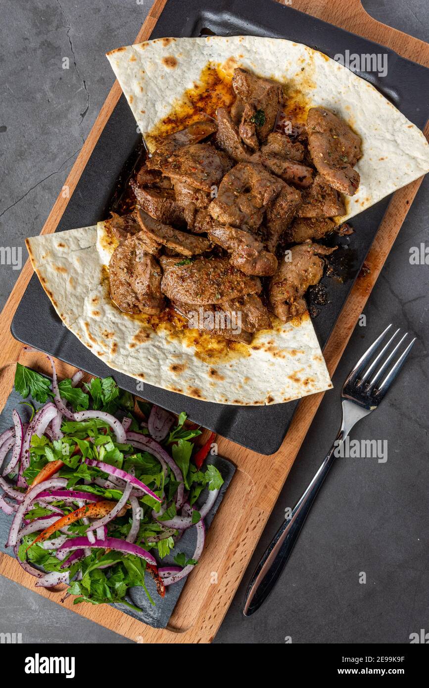 Traditional Turkish Liver kebab cuisine. Leaf Liver spicy. Delicious ...