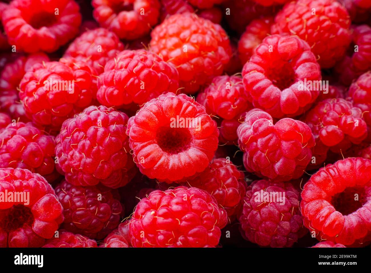 Fresh organic ripe raspberries background. Full frame Stock Photo - Alamy