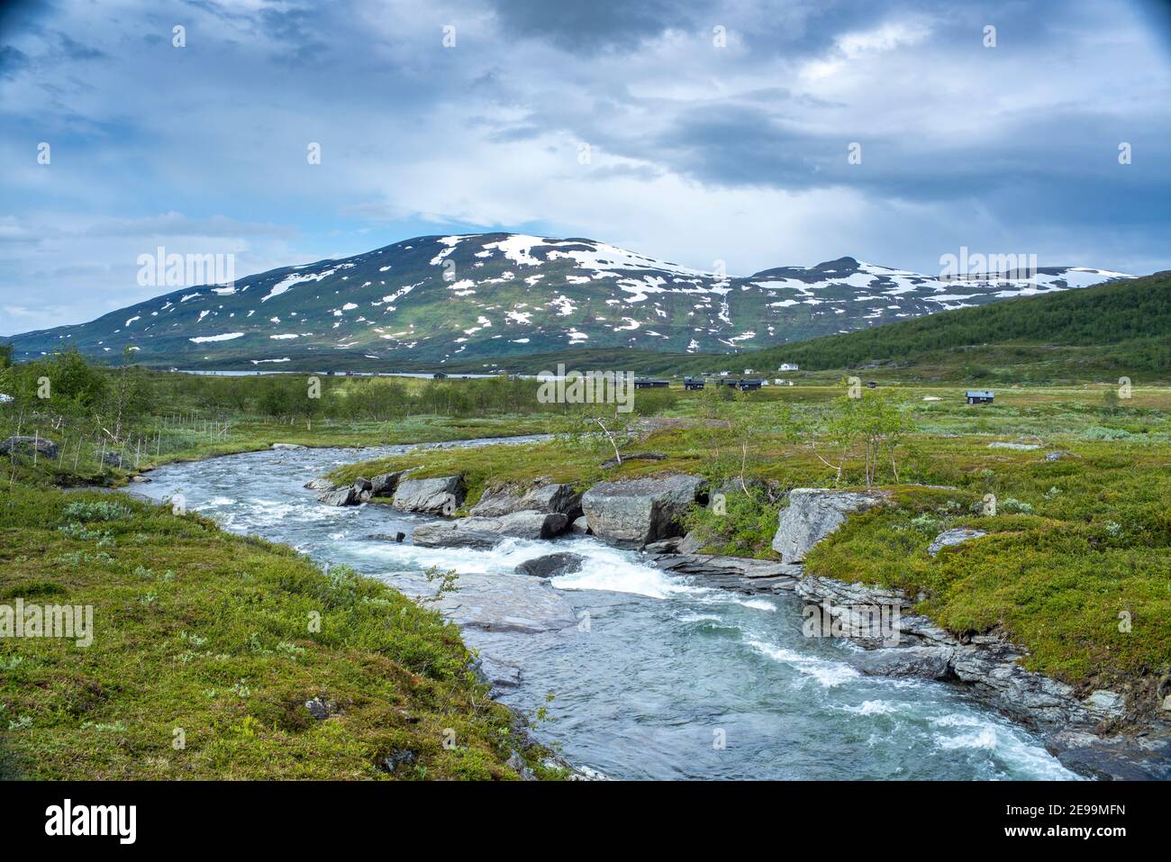 Turquoise River landscape and Arasluokta sami indigenous settlement ...