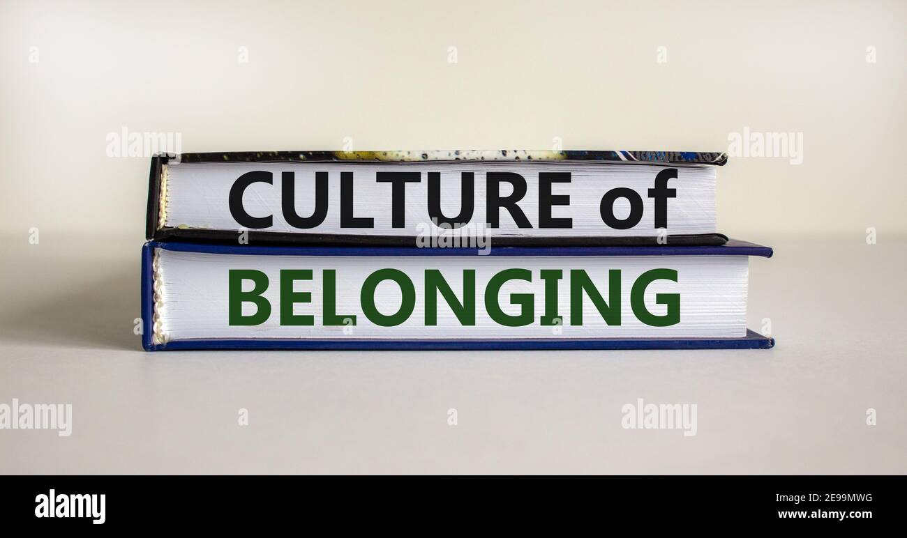 Culture of belonging symbol. Books with words 'culture of belonging' on ...