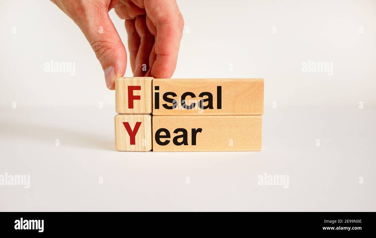 Fiscal year symbol. Concept words 'fiscal year' on wooden cubes and ...