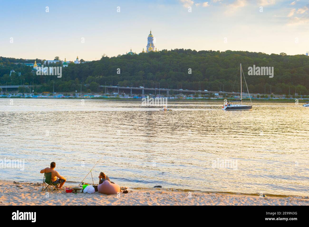 KIEV, UKRAINE - AUGUST 05, 2020: Couple fishing on the beach of Dnipro ...