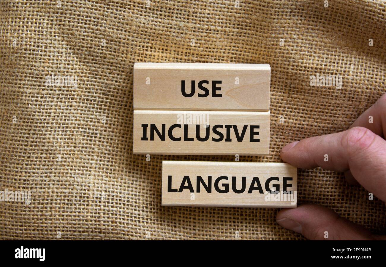Use inclusive language symbol. Wooden blocks with words 'Use inclusive ...