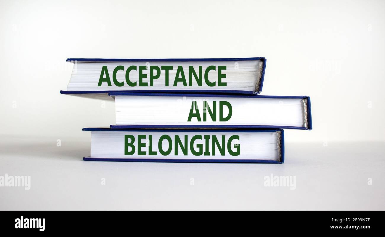 Acceptance and belonging symbol. Books with words 'acceptance and ...