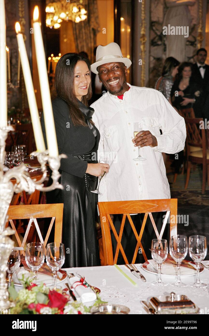Singer Jimmy Cliff and his wife drink some champagne prior to the AMADE ...