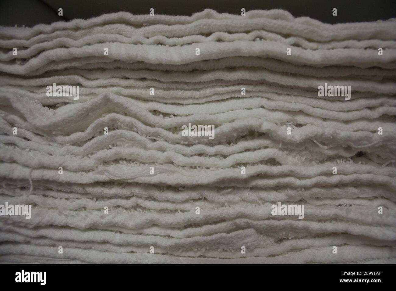 Rough edges of layered white hand towels Stock Photo - Alamy