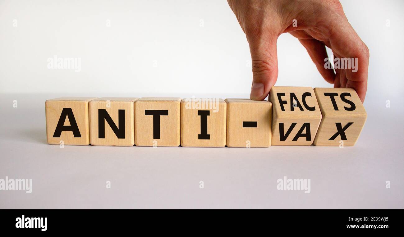 Anti-facts or anti-vax symbol. Doctor turns a cube, changes words 'anti ...