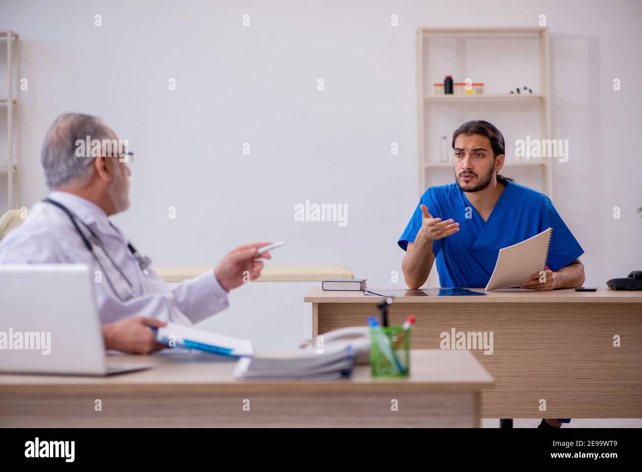 Two doctors working in the hospital Stock Photo - Alamy