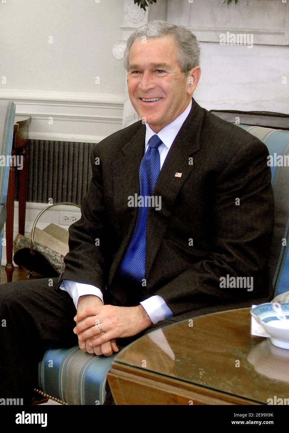 U.S. President George W. Bush smiles in the Oval Office at the White ...