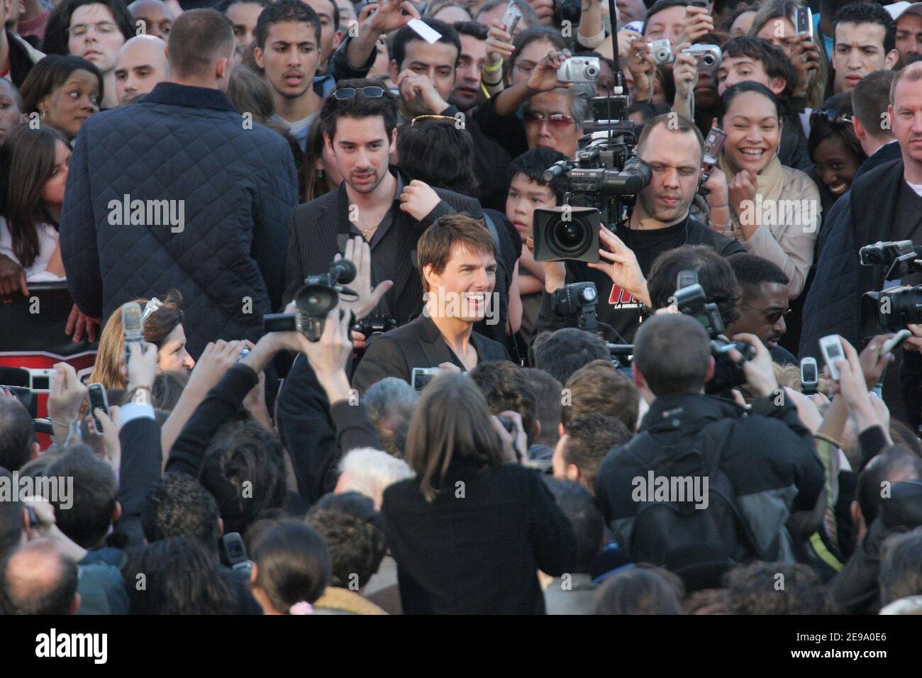 US actor Tom Cruise arrives by helicopter at La Defense, Paris business ...