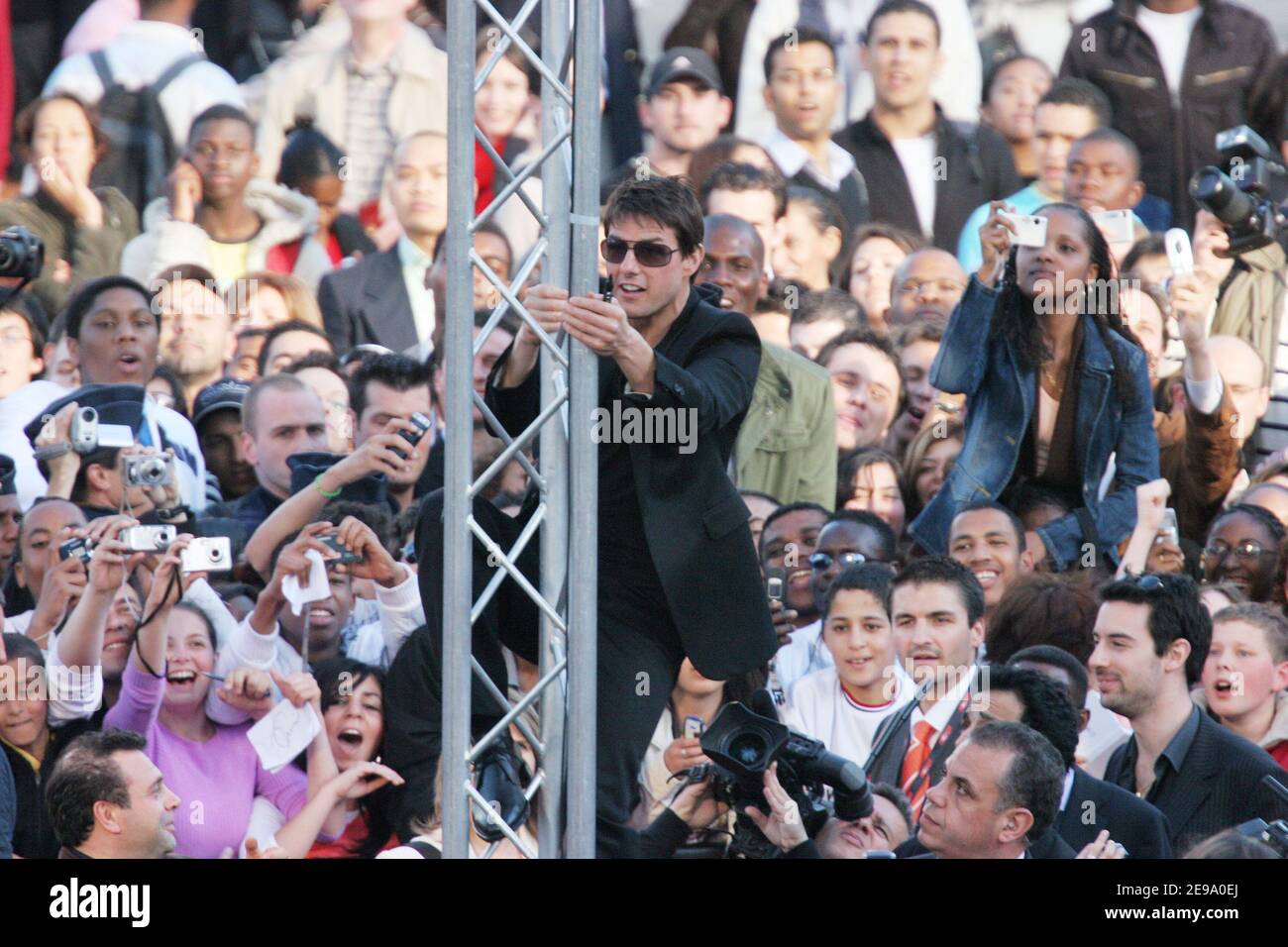 US actor Tom Cruise arrives by helicopter at La Defense, Paris business ...