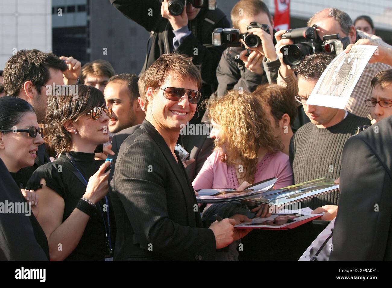 US actor Tom Cruise arrives by helicopter at La Defense, Paris business ...