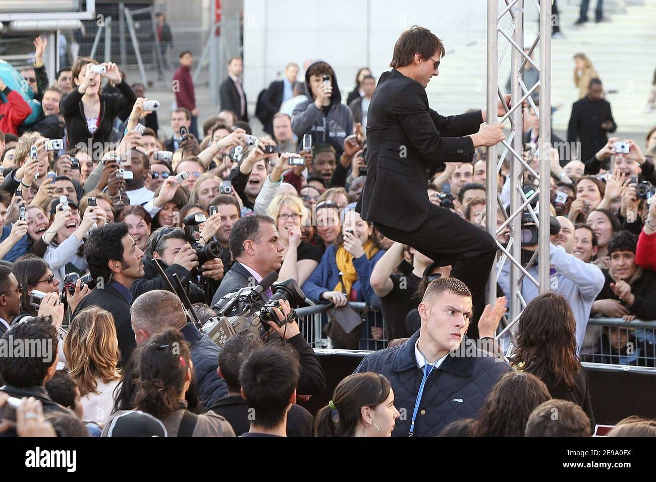 US actor Tom Cruise arrives by helicopter at La Defense, Paris business ...