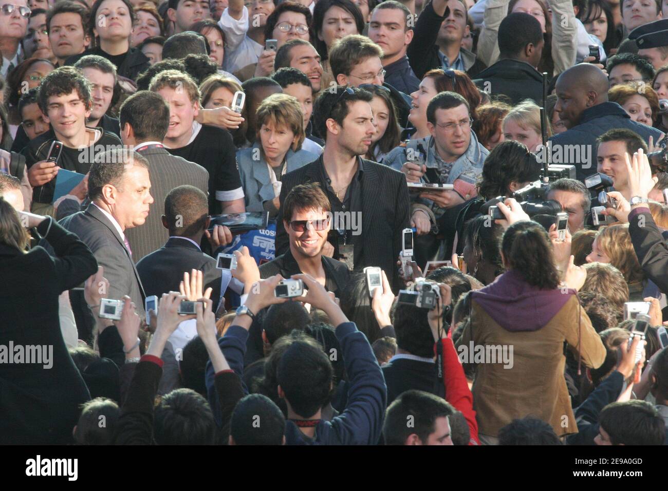 US actor Tom Cruise arrives by helicopter at La Defense, Paris business ...