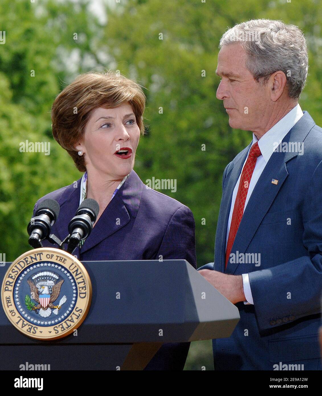 "President George W. Bush and First Lady Laura Bush deliver a speech in ...