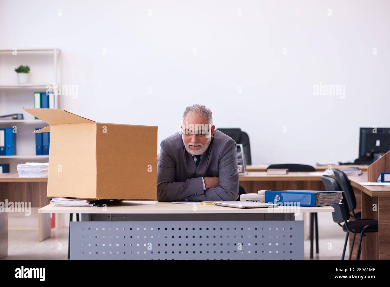 Old employee being fired from his work Stock Photo - Alamy