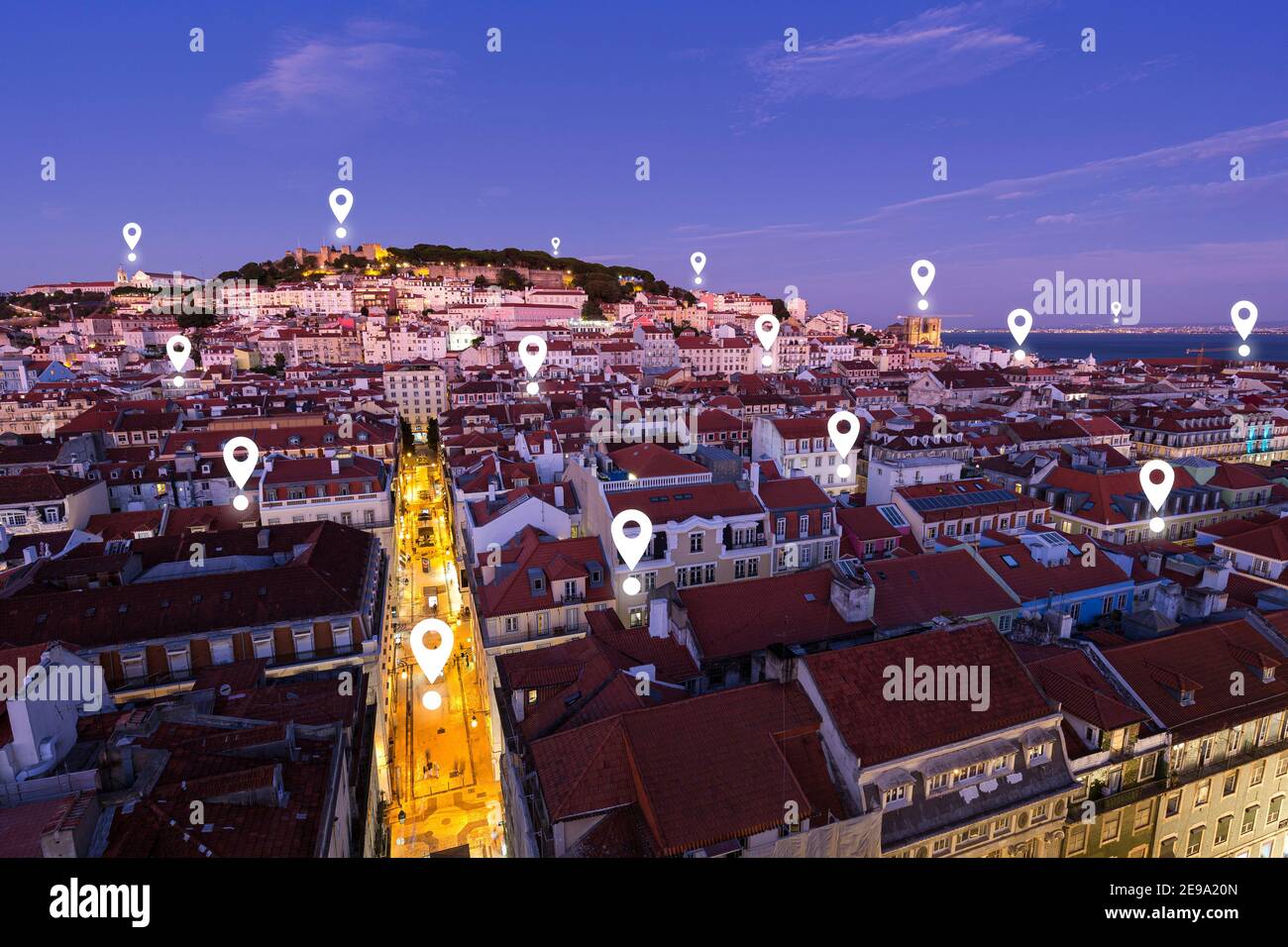 Map pin icons on Lisbon cityscape at dusk. View of downtown Lisbon ...