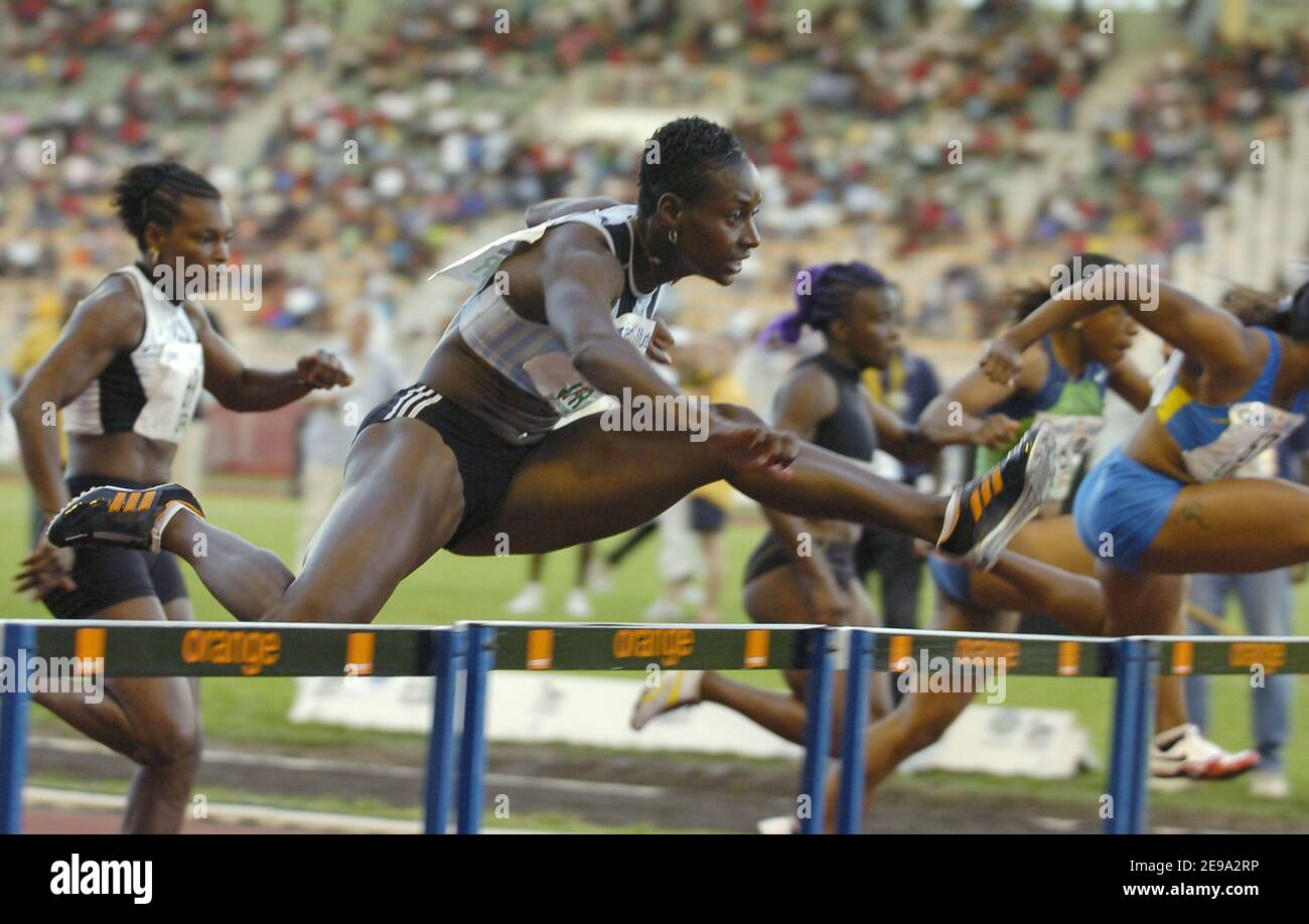 USA's Damu Cherry performs on women's 100 meters hurdles during the ...