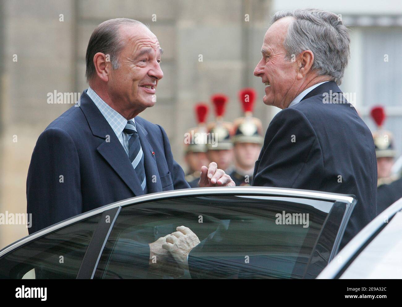 President Jacques Chirac receives former US President George Bush at ...