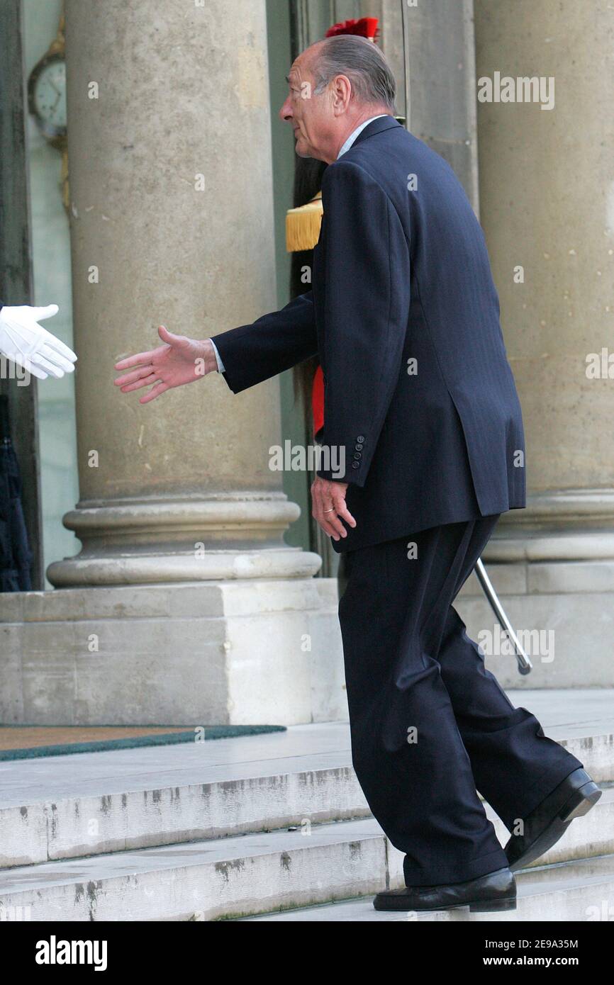 President Jacques Chirac receives former US President George Bush at ...