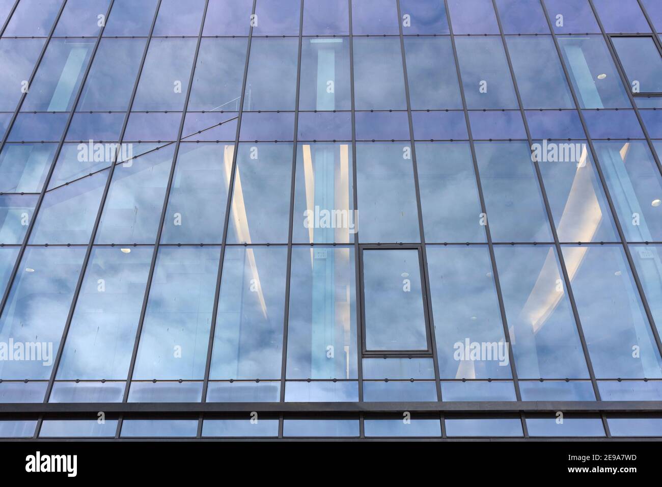 Big Blue Glass Windows at Modern Building Stock Photo - Alamy