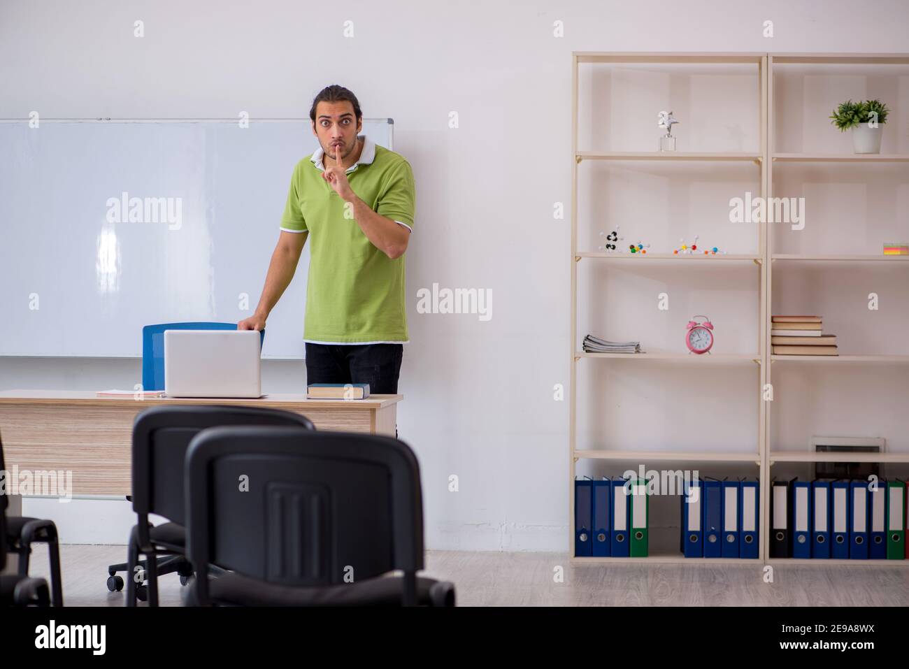 Young student in business presentation concept Stock Photo - Alamy