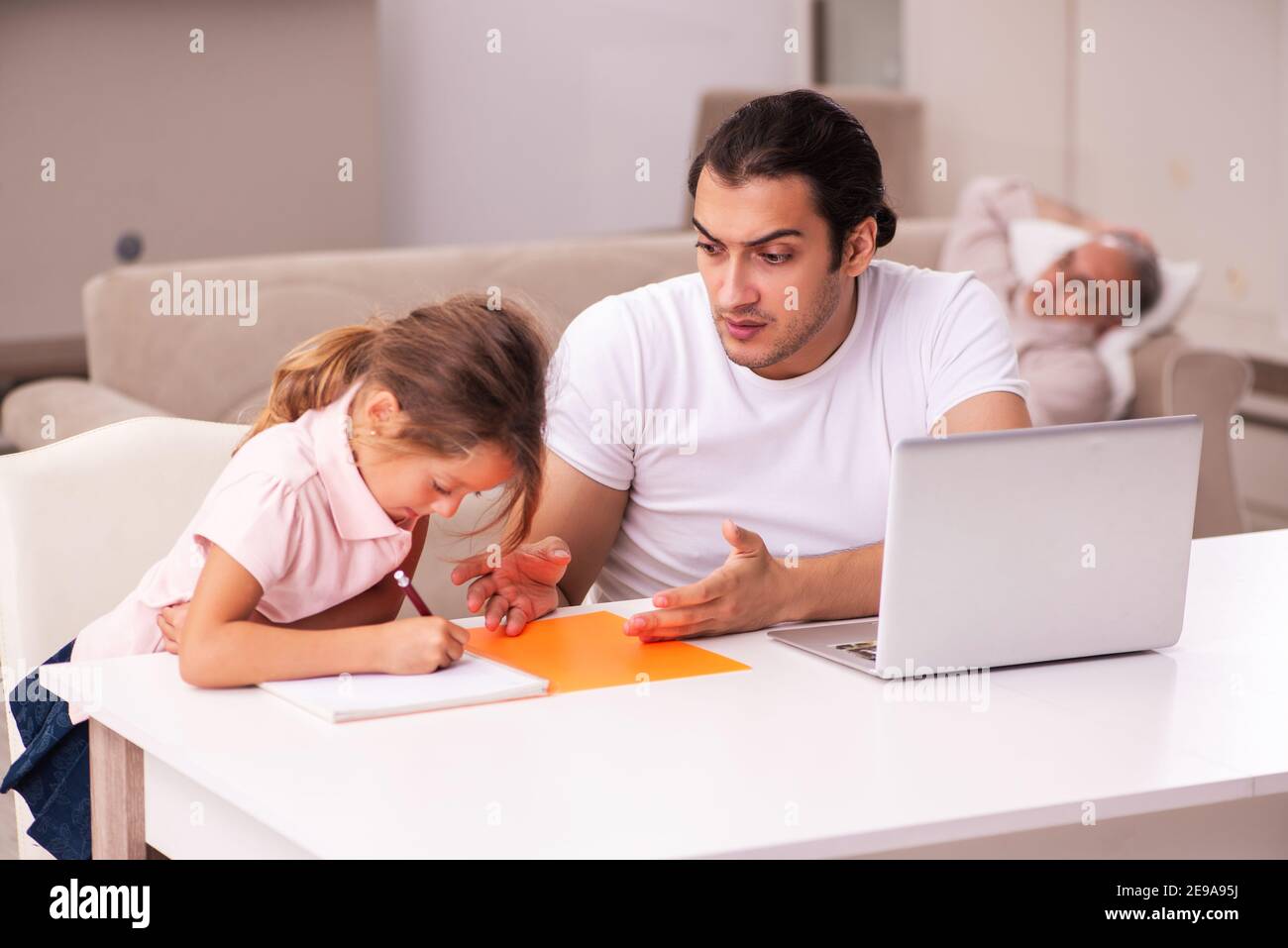 Three generations at home in early development concept Stock Photo - Alamy