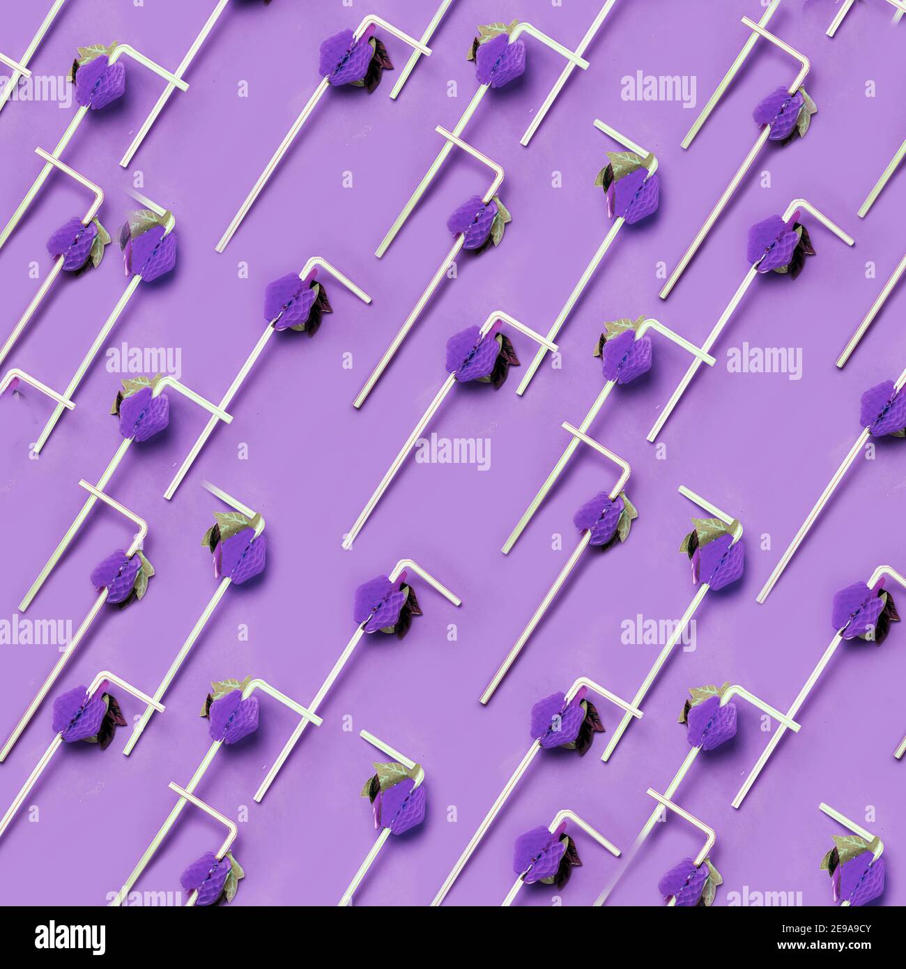 a pattern of straws with purple lemon-shaped head on purple background ...