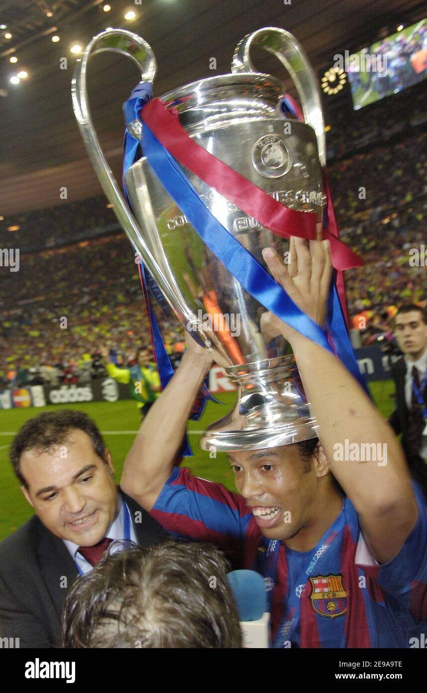 Barcelonas ronaldinho celebrates with the uefa champions league trophy ...