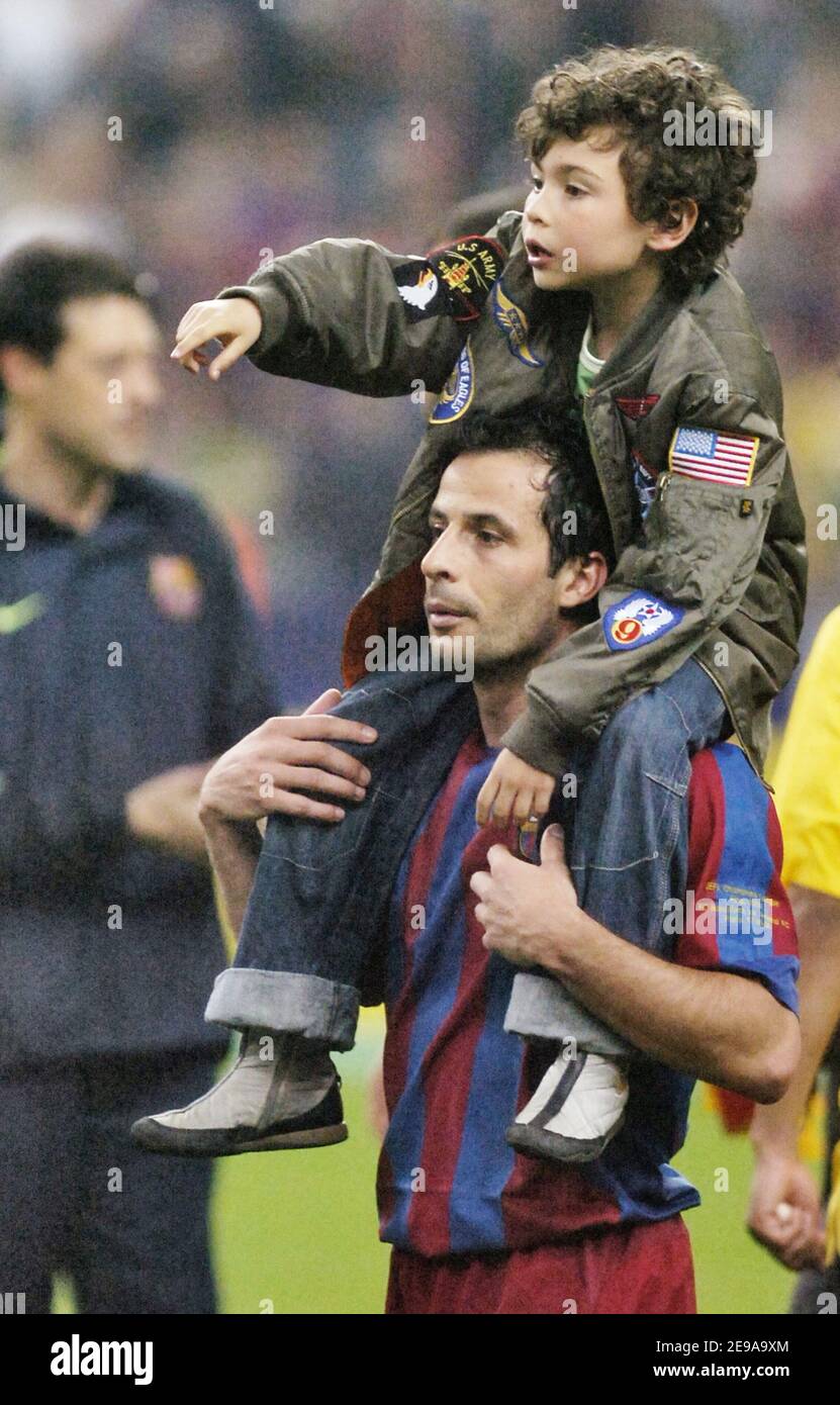 Barcelona's Ludovic Giuly with his son after the Champions League final ...