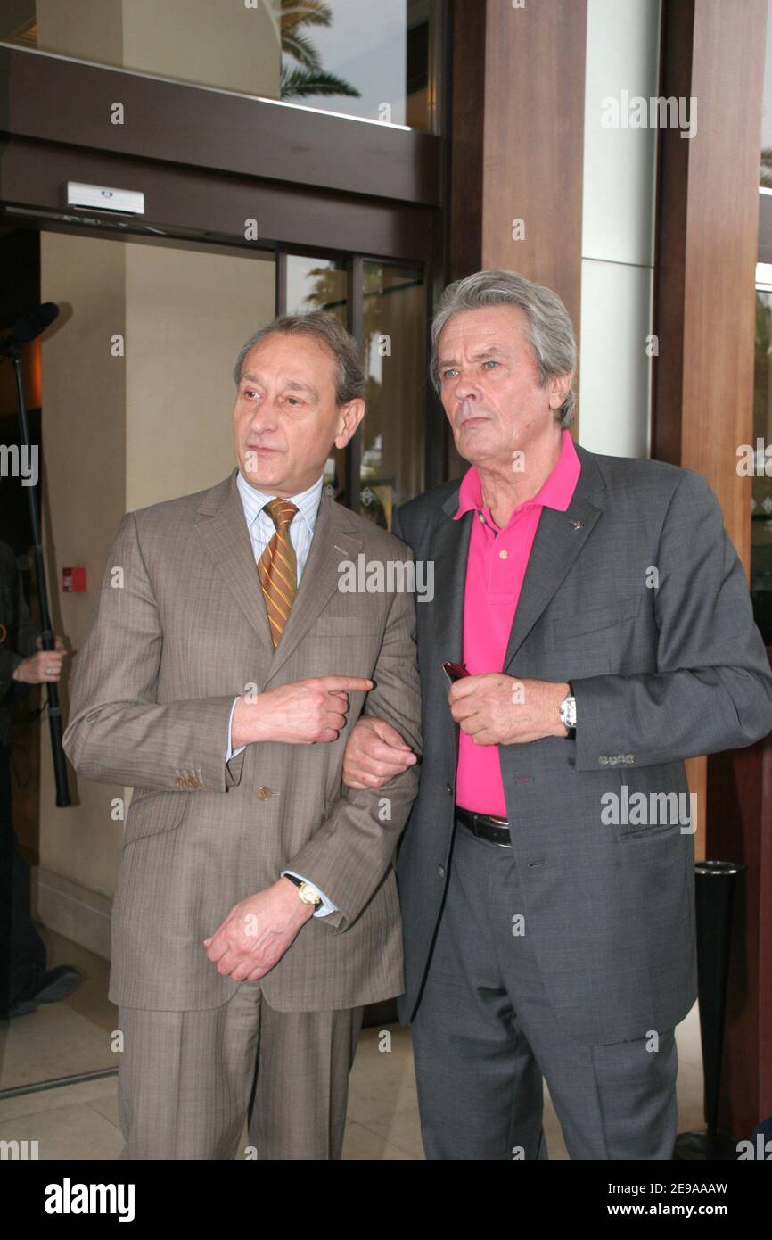 French movie legend Alain Delon and Mayor of Paris Bertrand Delanoe ...