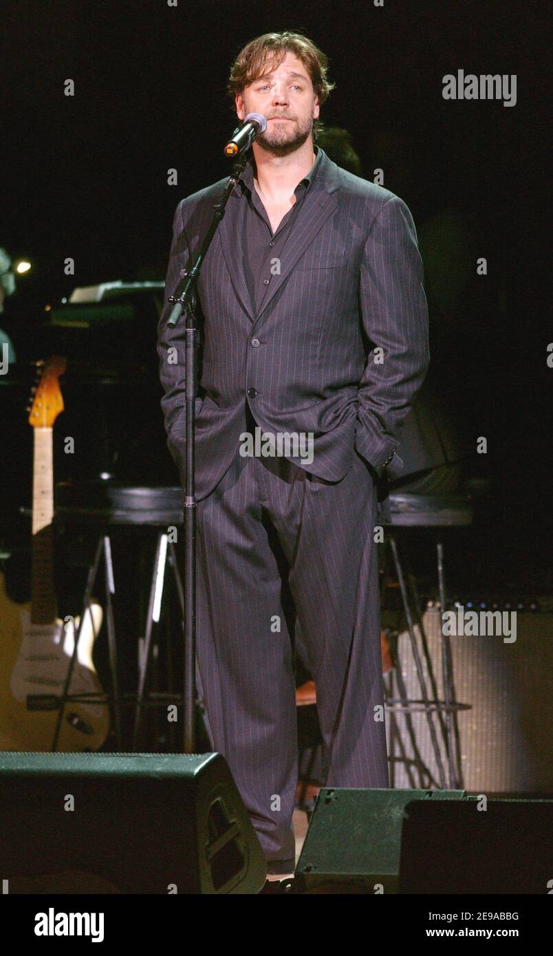 Russell Crowe performs live during the 'Shades of Woodstock : Songs of ...